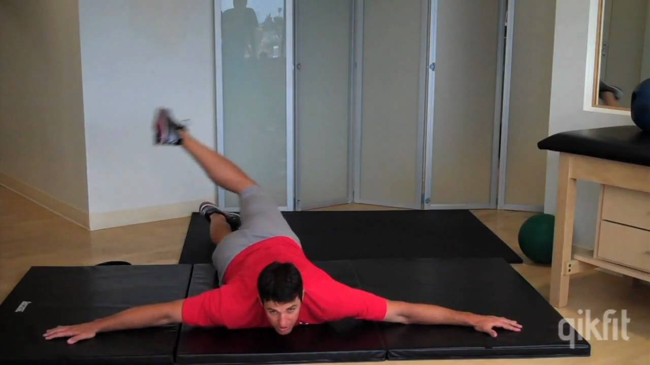 Qikfit-Prone Scorpion Stretch - YouTube