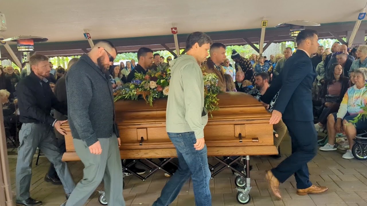 Caskets of Ben and Max Morrissey are carried into hearses at ...