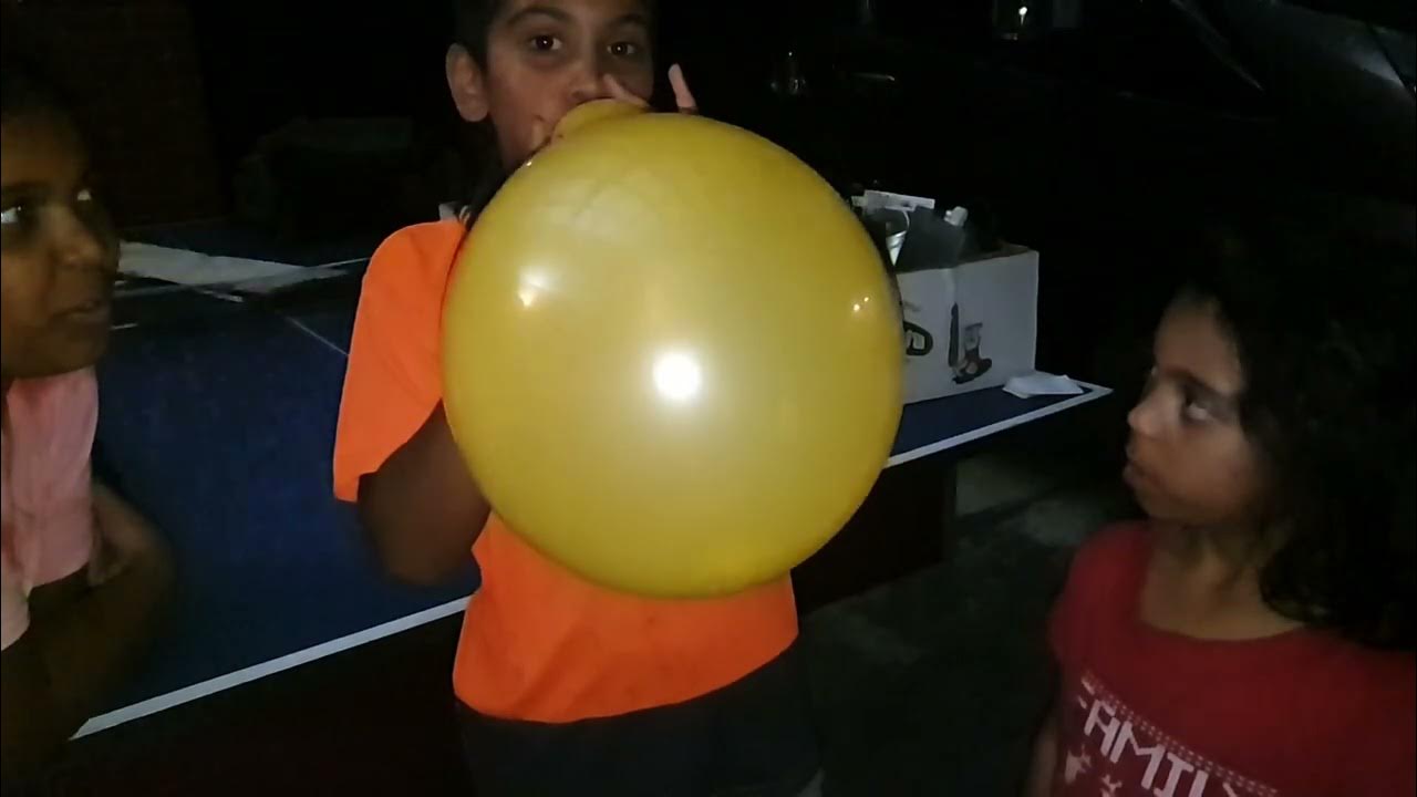 Blowing up a balloon until it pops - YouTube