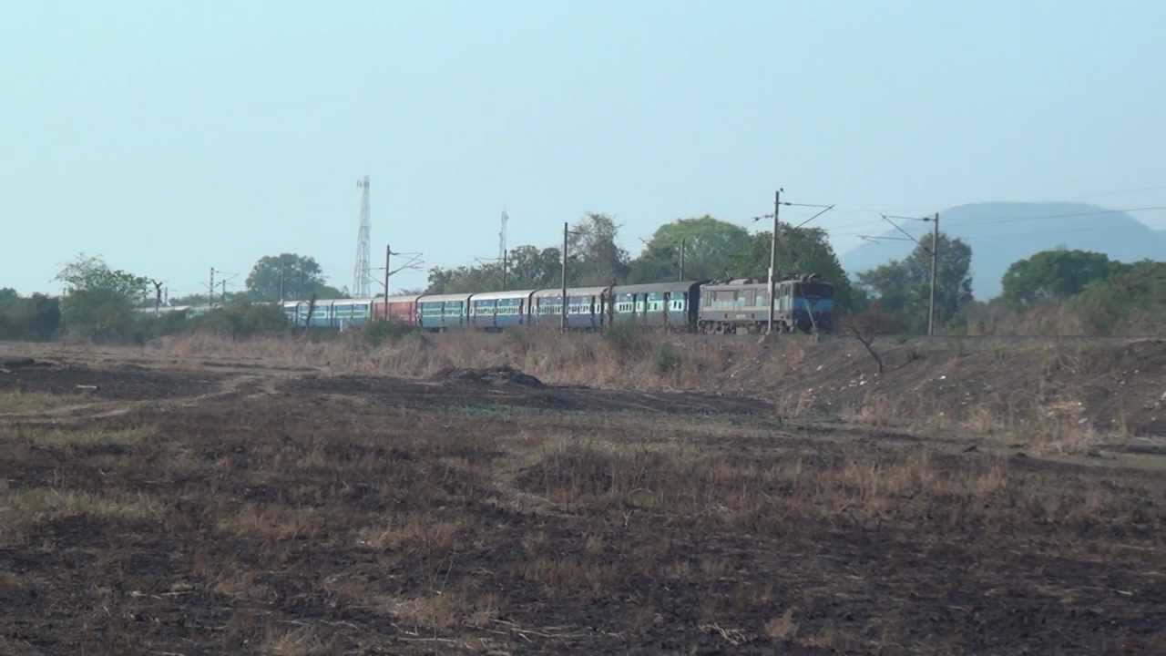 SAURASHTRA EXPRESS WITH MILK TANKER WAGON ACCELERATING AT THE SAPHALE ...