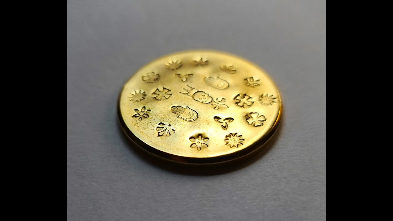 Free hand stamping a new set of Brass art coins - YouTube