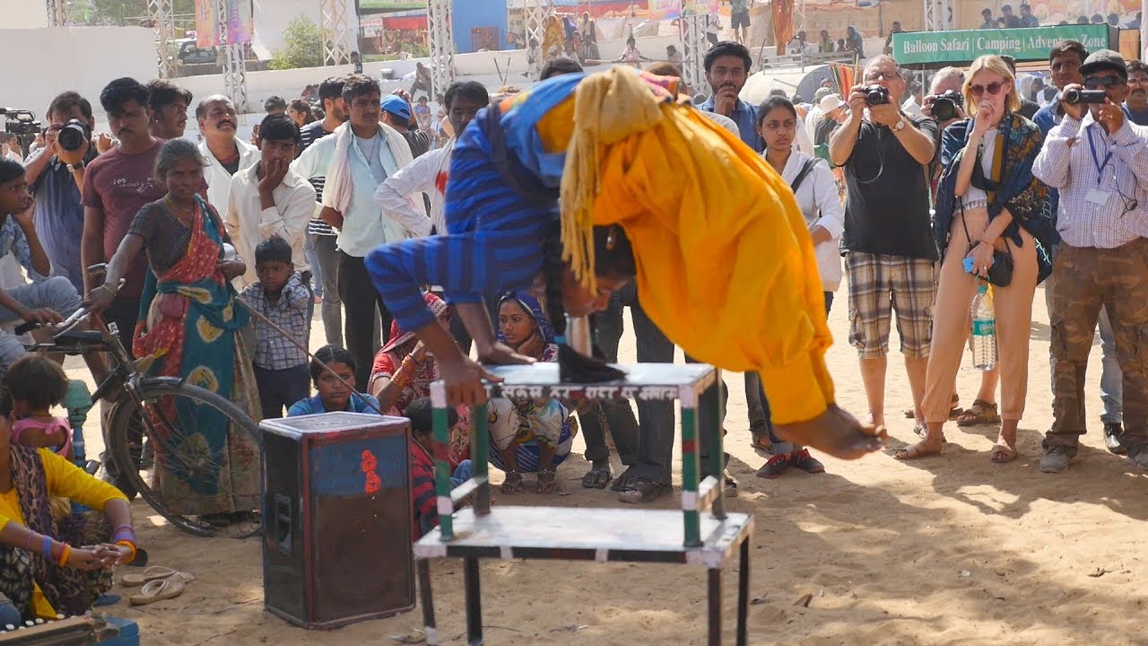 Indian Circus street Show Acrobatics on Road Performing by Girl at Pushkar Fair - YouTube