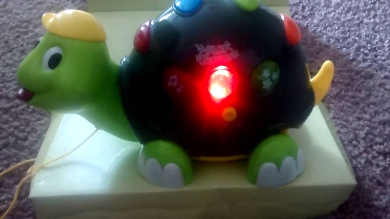 Pull along musical tortoise - YouTube