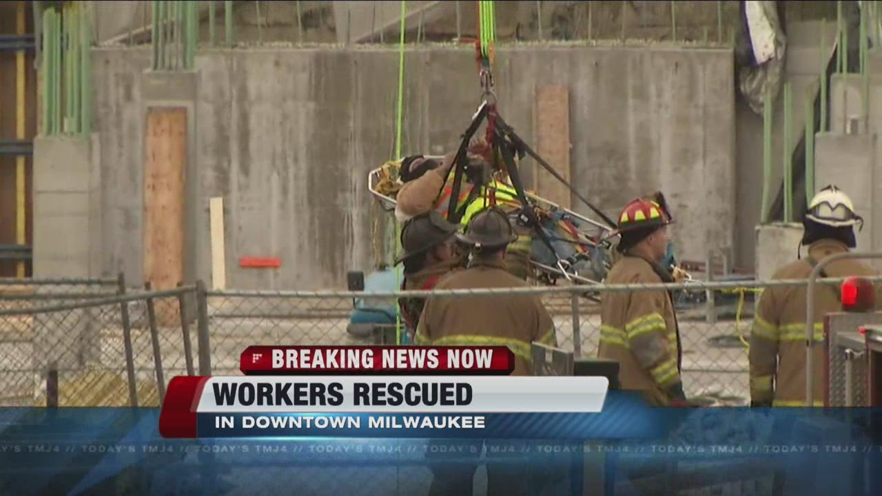 Construction workers rescued in downtown Milwaukee - YouTube