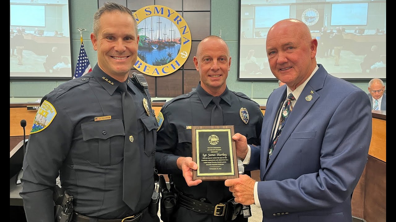 Awarding Commendation Certificate and Plaque to Sergeant James Sharkey ...