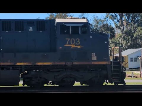 (late) CSX 703 on a hopper train though Folkston - YouTube