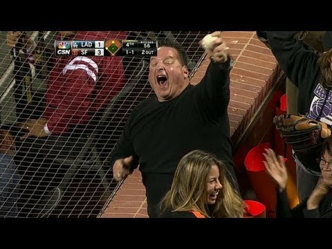 Fan catches foul to redeem his previous drop