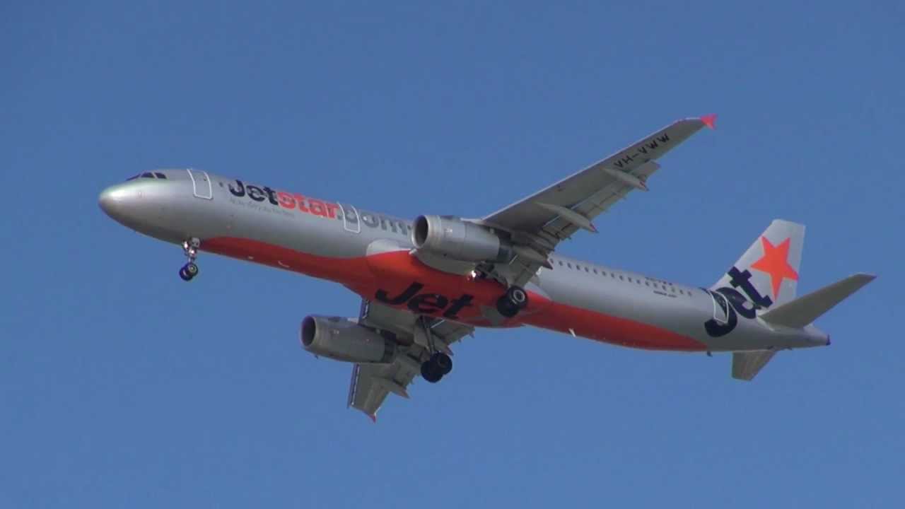 Jetstar Plane coming in for landing. - YouTube
