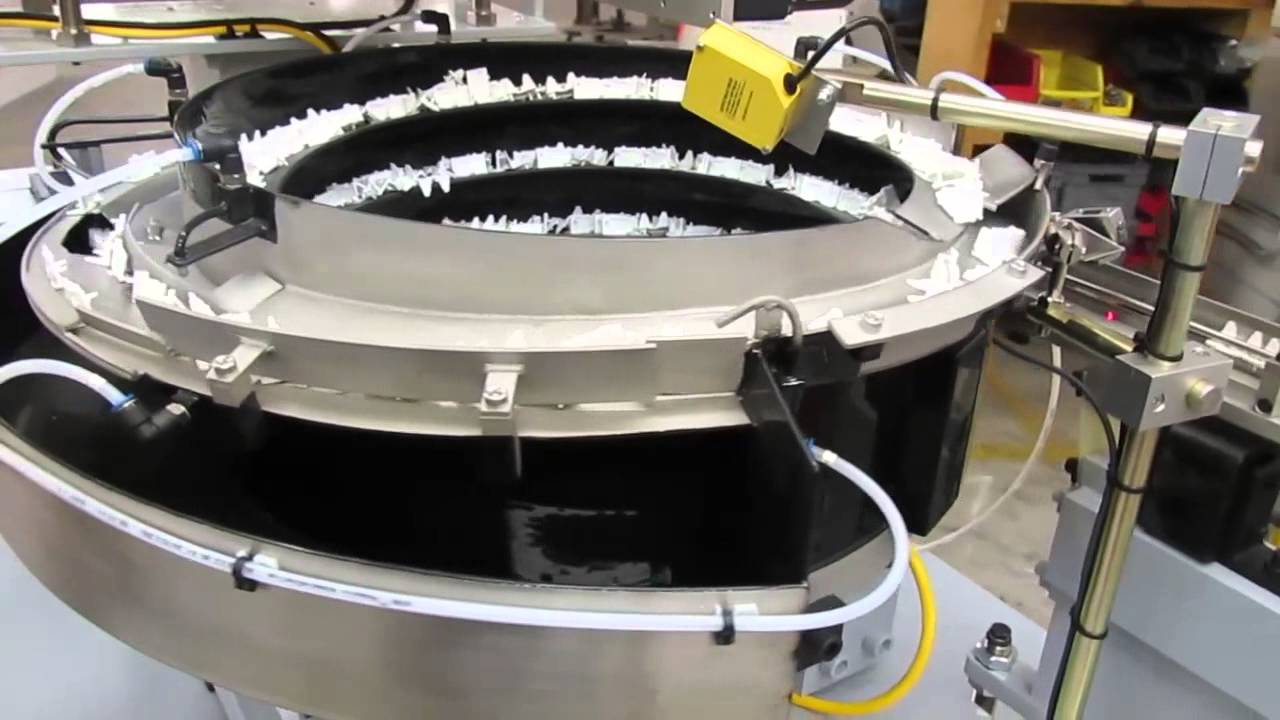Vibratory Parts Feeder Optimized for Gentle Handling of Parts - YouTube
