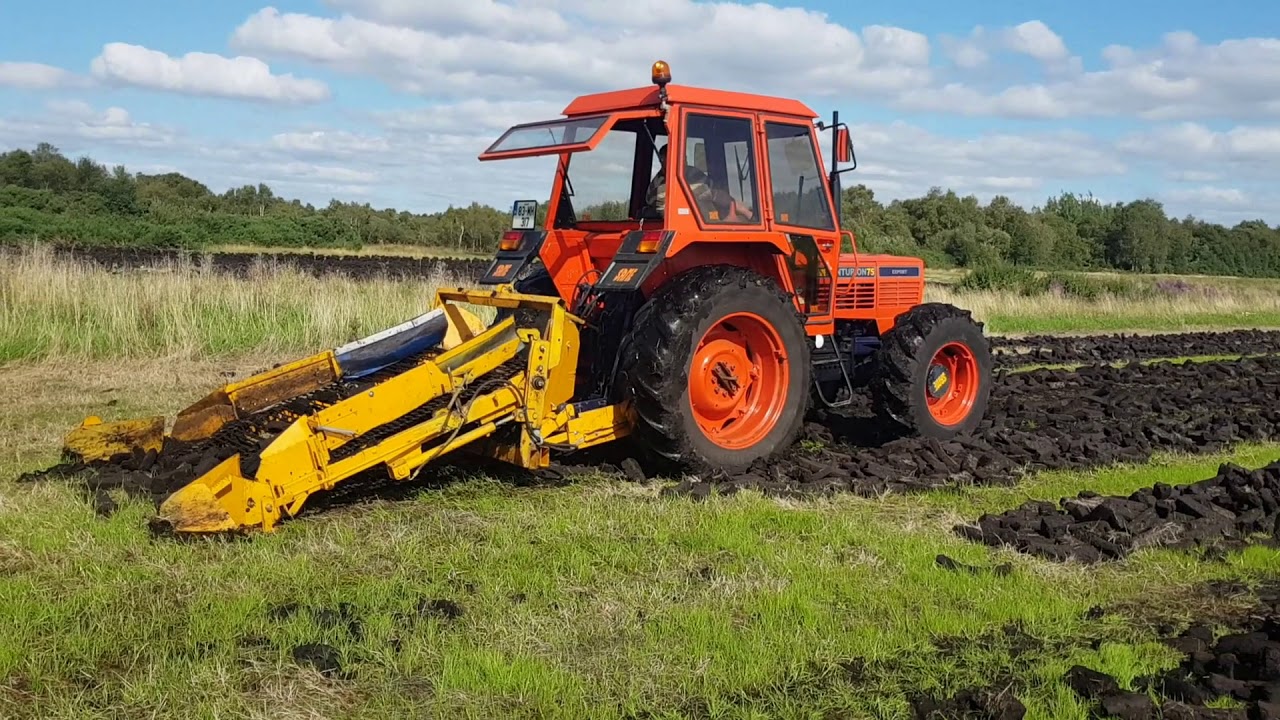 Turf turner loader, turning turf - YouTube