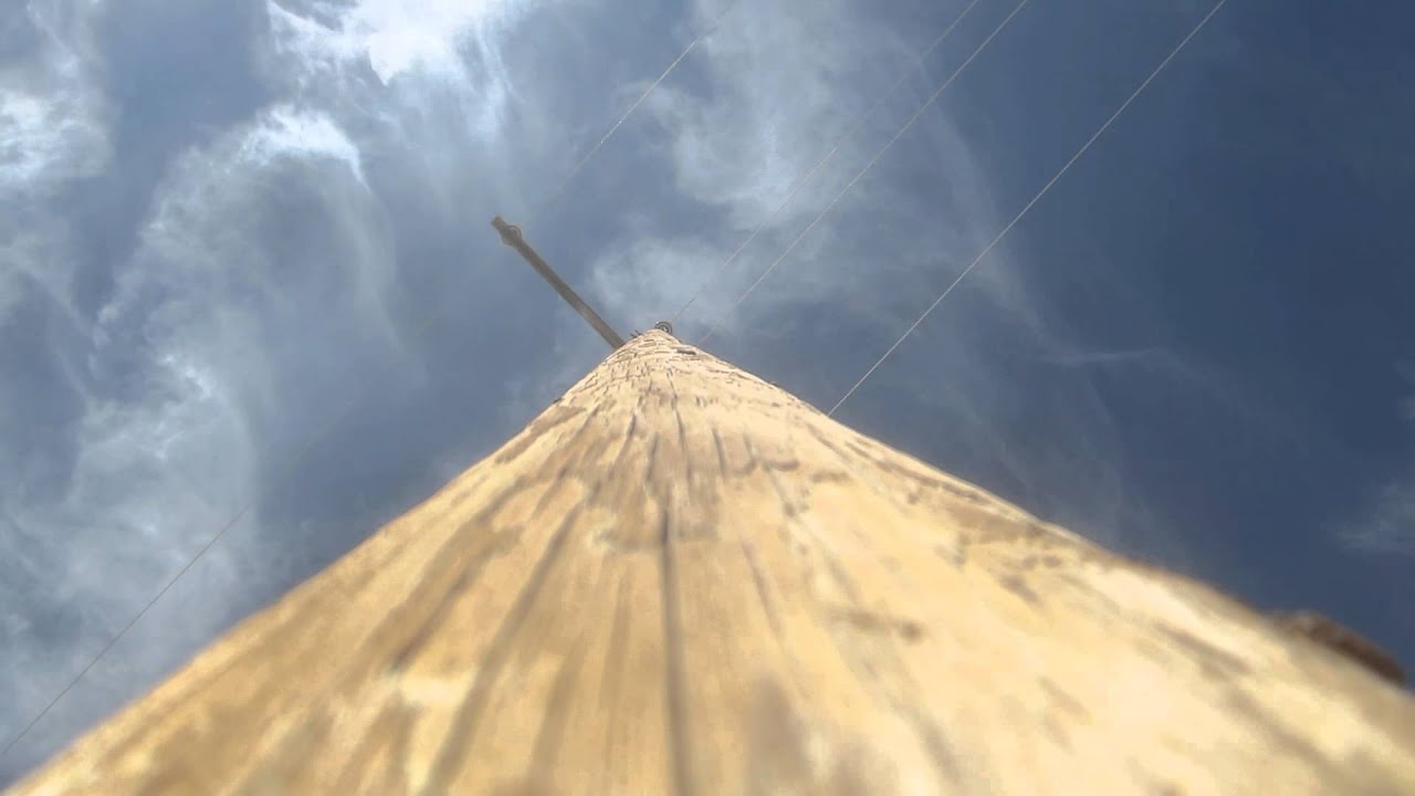 Power pole vibrating in the wind - YouTube