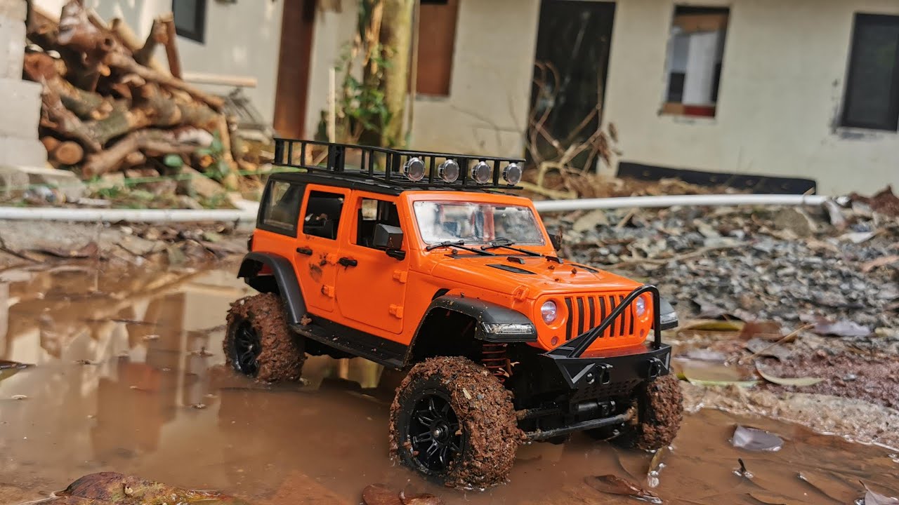 MN 128 Jeep Wrangler Rubicon Main Tanah habis Hujan - YouTube