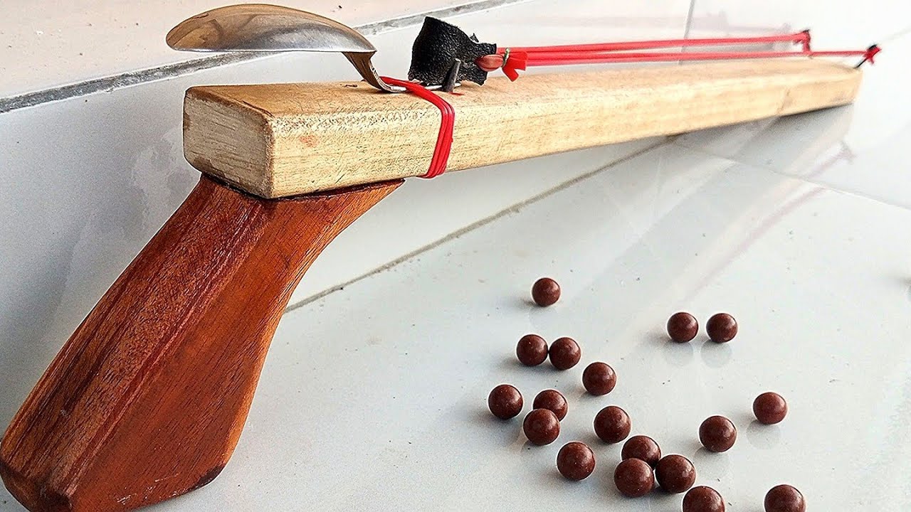 Unique slingshot with a spoon on top - YouTube