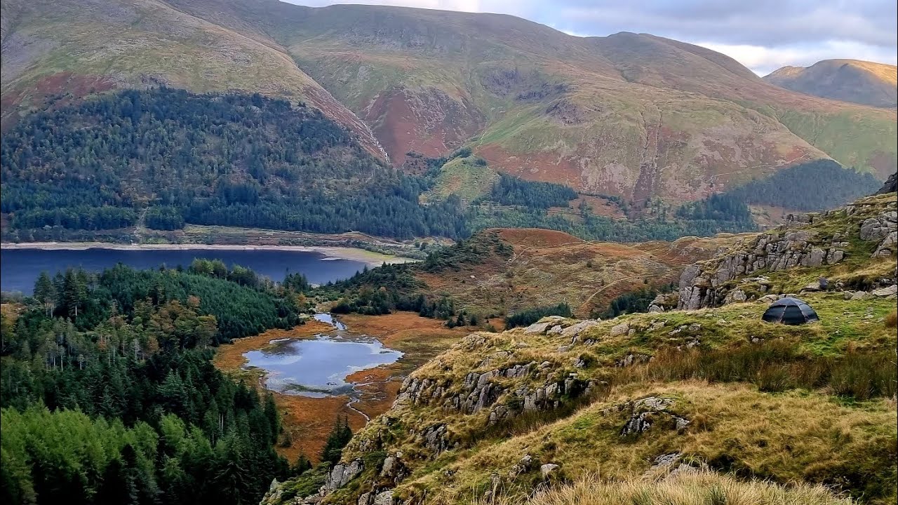 Solo wild camp above Harrop Tarn, English Lake District, next to a hidden waterfall. October ...