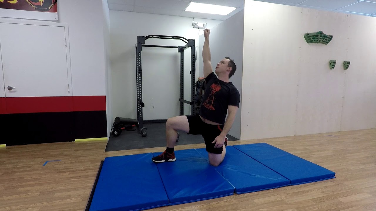 How to Perform a Kettlebell Turkish Get Up - Exercise Tutorial - YouTube