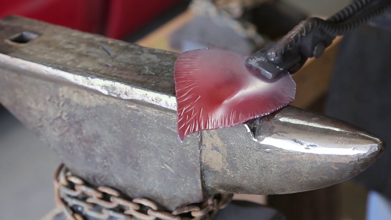 Forging a calla lily hand made blacksmith flower - YouTube