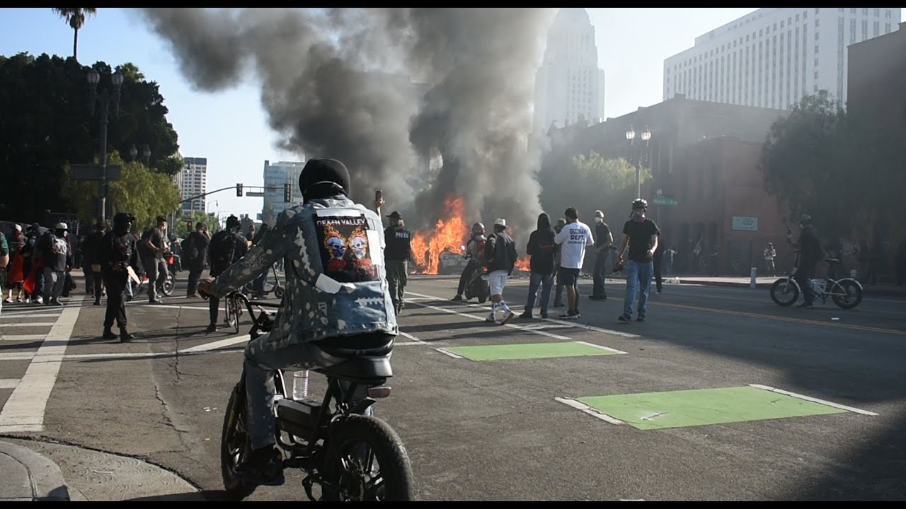 Cyclist observes Waymo vehicles on Fire downtown Los Angeles Trump ICE ...