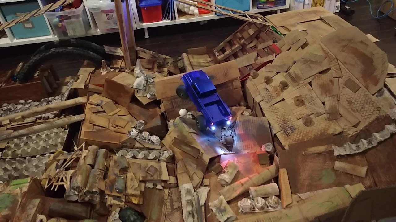 Upgraded fy002 on cardboard crawler course - YouTube