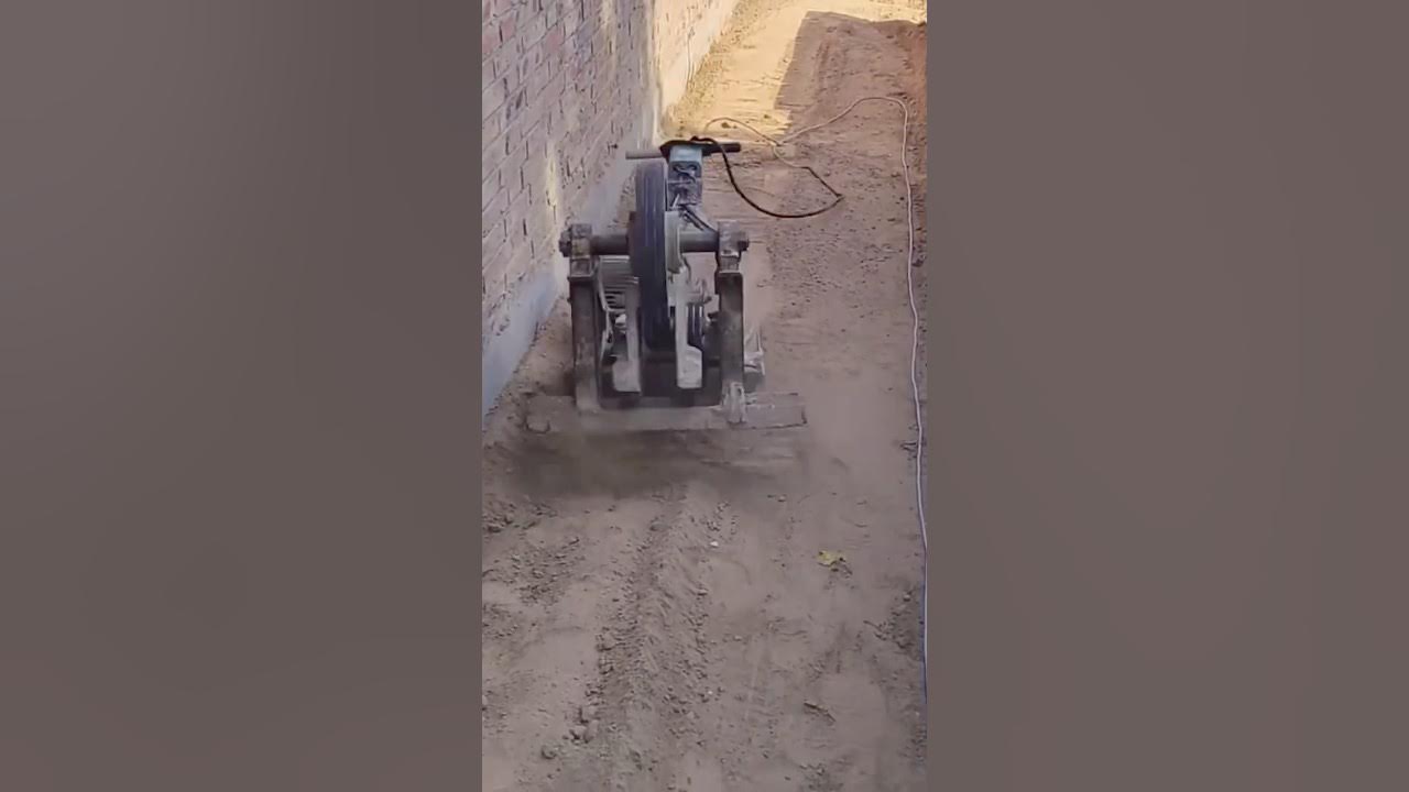 Self-operating ground compaction tool. - YouTube