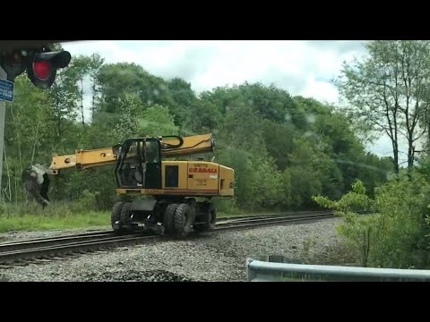 CHECK OUT “gradall xl 3300” (big call machines) on railroad tracks ...