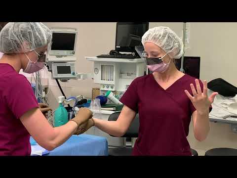 Assisted gown removal - YouTube