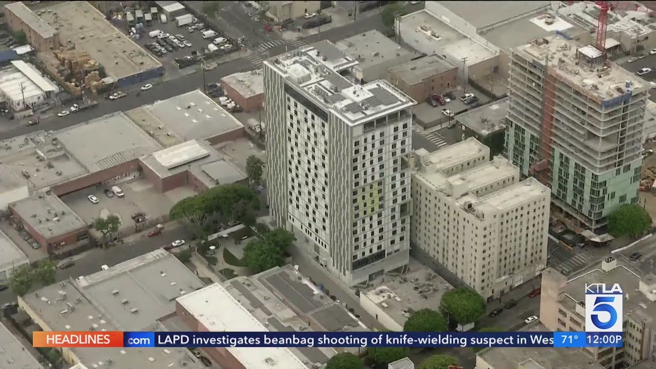 DTLA homeless housing tower cost $600K per unit to build - YouTube