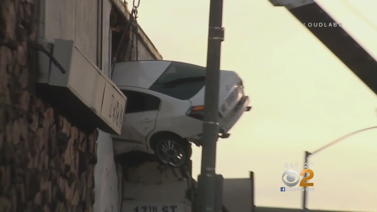 Car Goes Airborne, Slams Into Second Floor Of California Office - YouTube