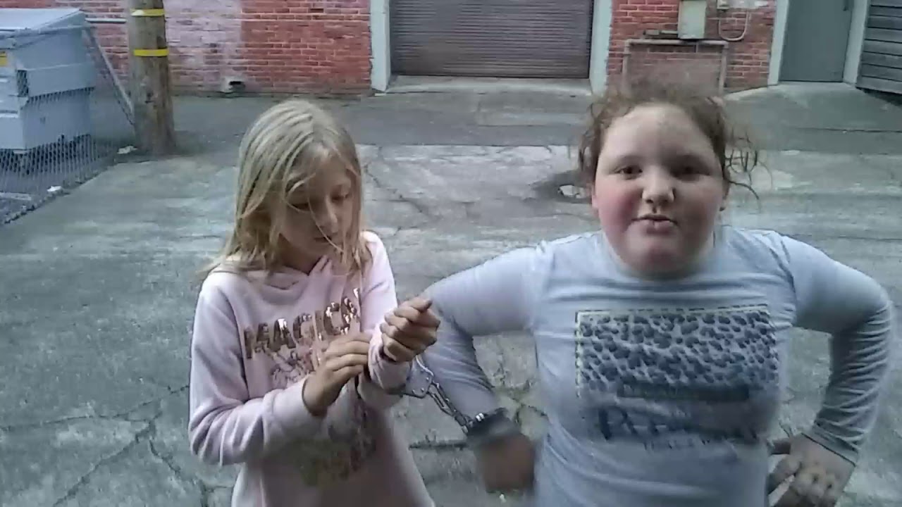 24 hour challenge handcuffed together m&m - YouTube