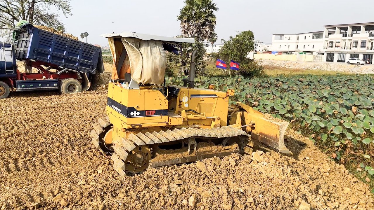 Komatsu Bulldozer Clearing Land with Power and Precision at a ...