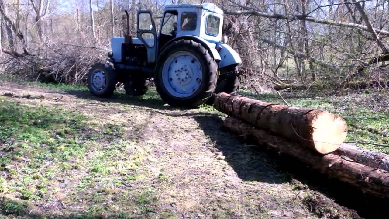 T-40 AM Tractor pulling logs - YouTube