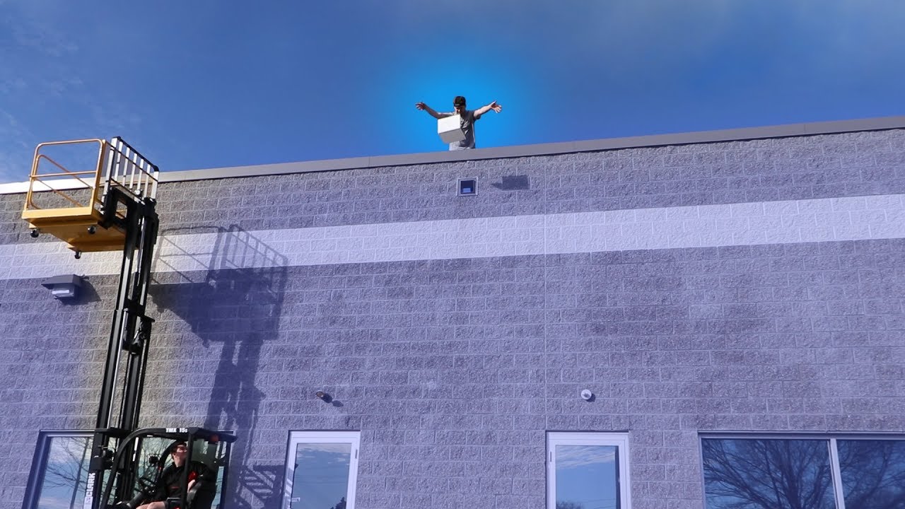 GUY DROPS LAPTOP OFF ROOF - YouTube