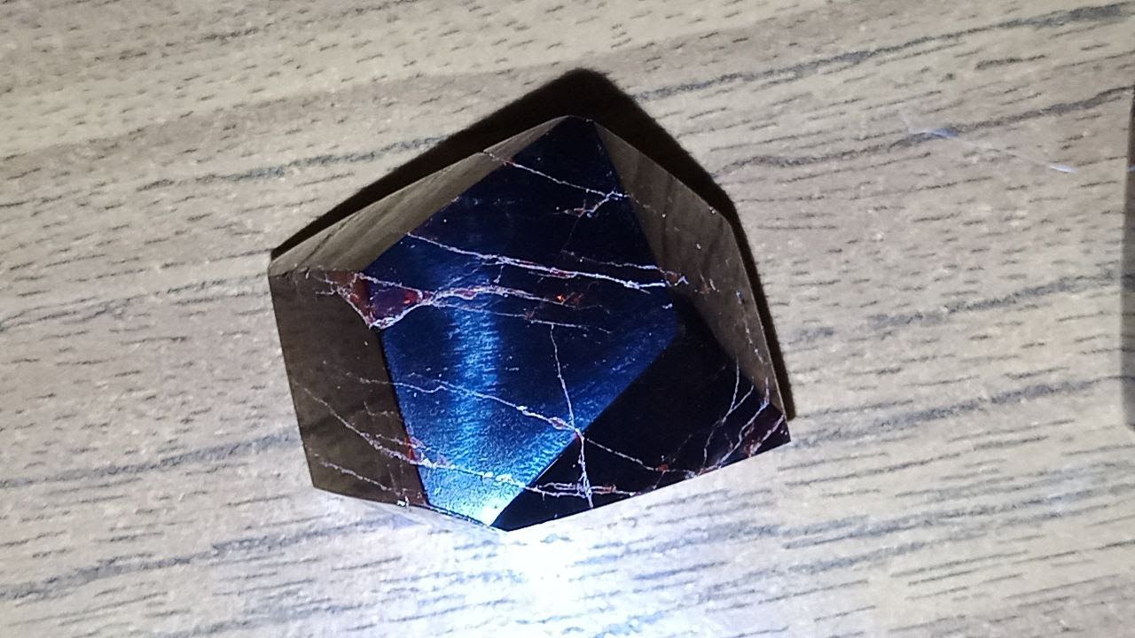 Garnet crystal "Black Sun" - YouTube