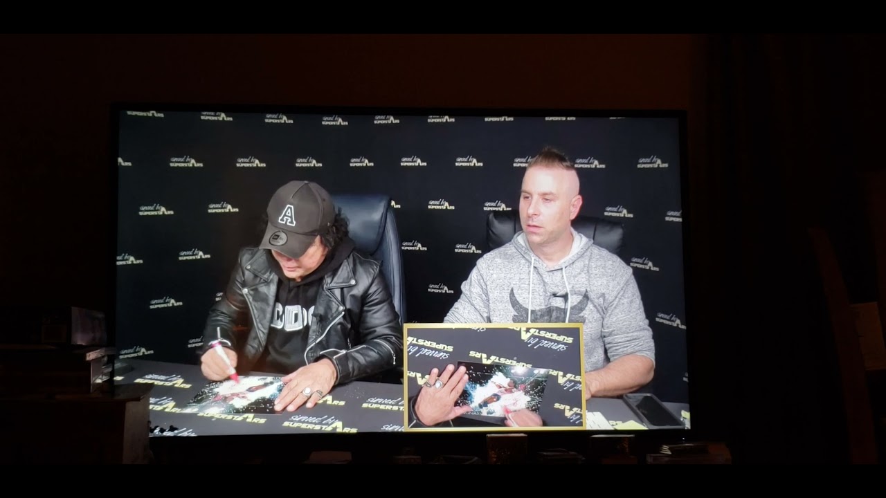 Atsushi Onita, of FMW fame, signing a 8x10 for Naomi with Rob Feinstein ...