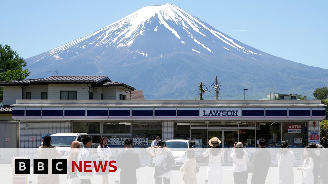 Japanese town blocks iconic Mount Fuji view to deter tourists | BBC ...