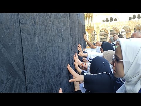 more people touching the Kaaba and praying for Dua around the Kaaba ...