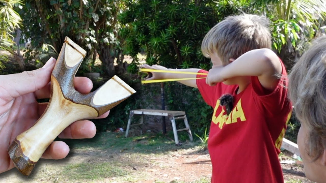 Teaching the Neighbor Kid How to Shoot a Slingshot - YouTube
