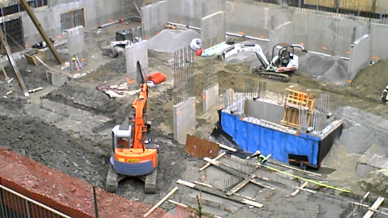 Two small diggers working - YouTube