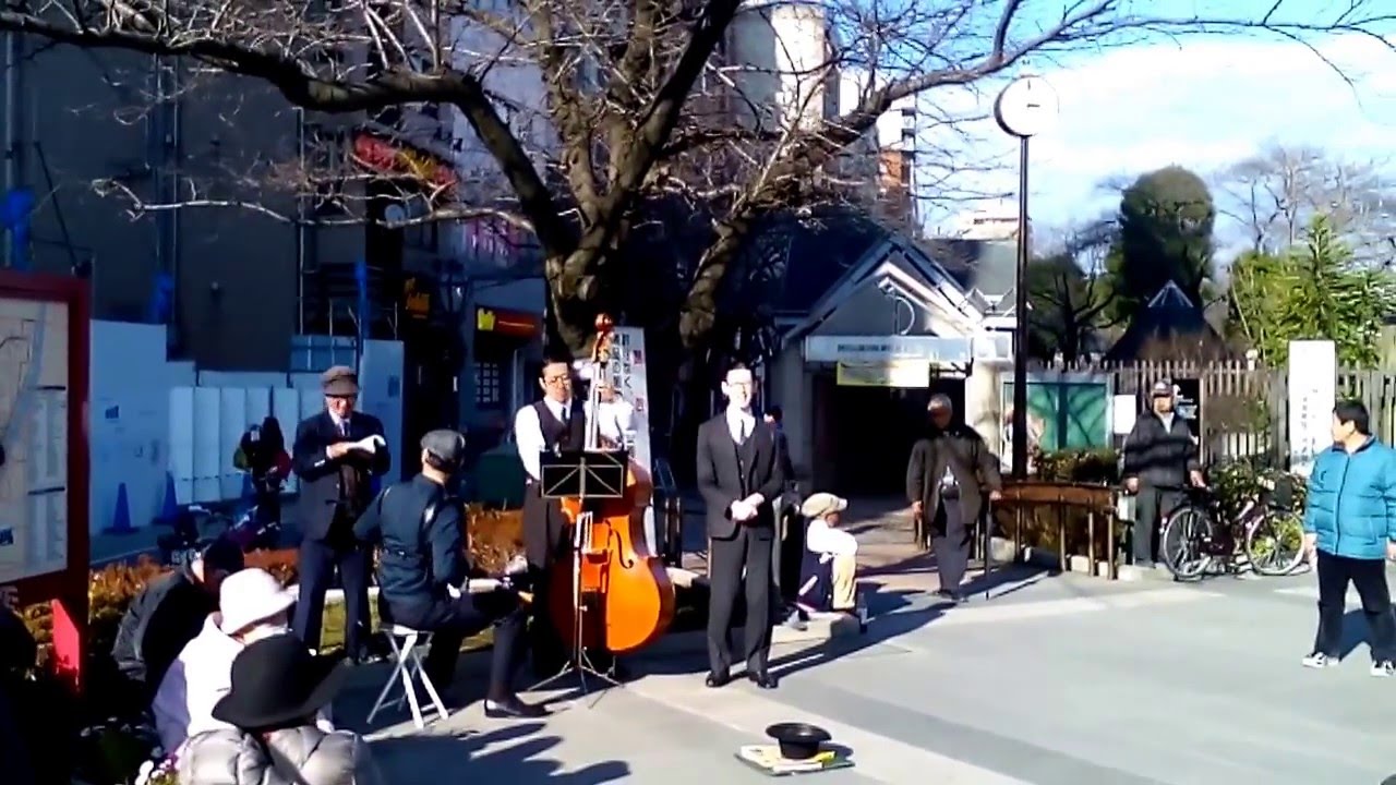 Japanese singer performs in Tokyo street - YouTube