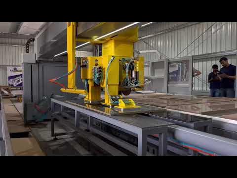 Aitalmac robot loading sawjet then swapping the part to the cnc router(1) - YouTube