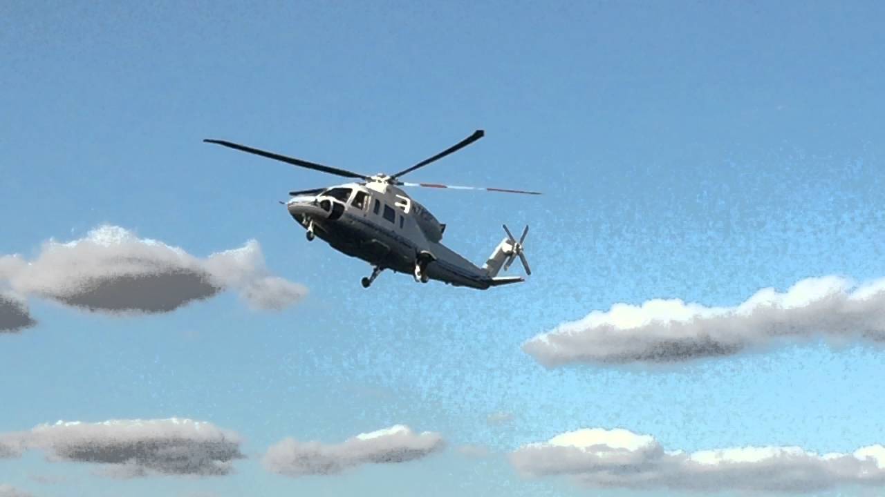 PRIVATE HELICOPTER MAKING A APPROACH & LANDING AT HELIPORT ON 34TH ST ...
