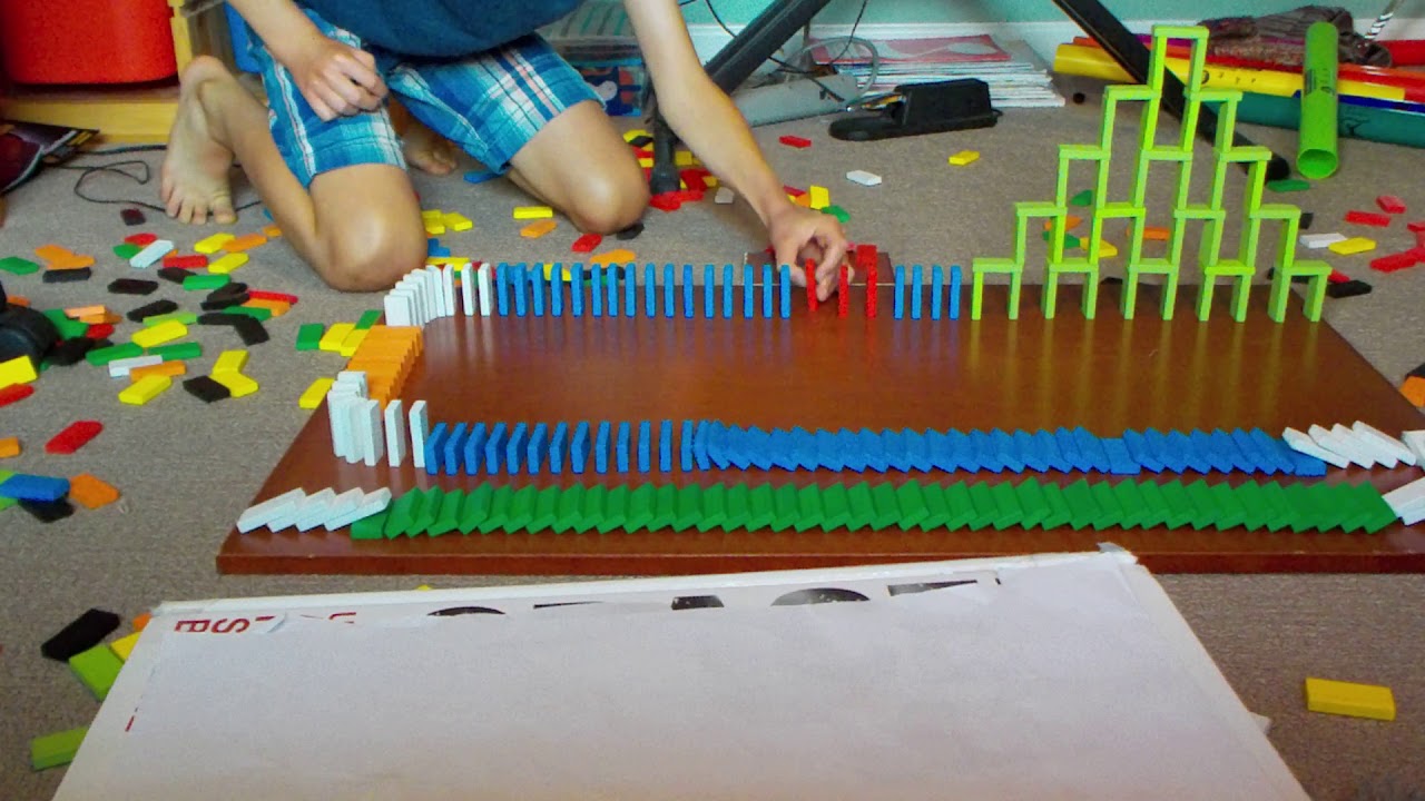 Domino chain reaction builder's challenge by Domino Dog - YouTube