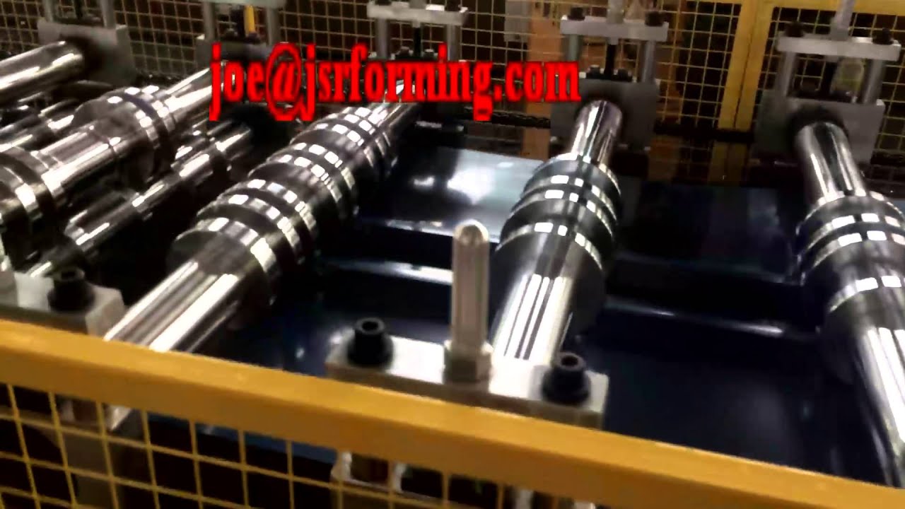 Cladding sheet roll forming machine - YouTube