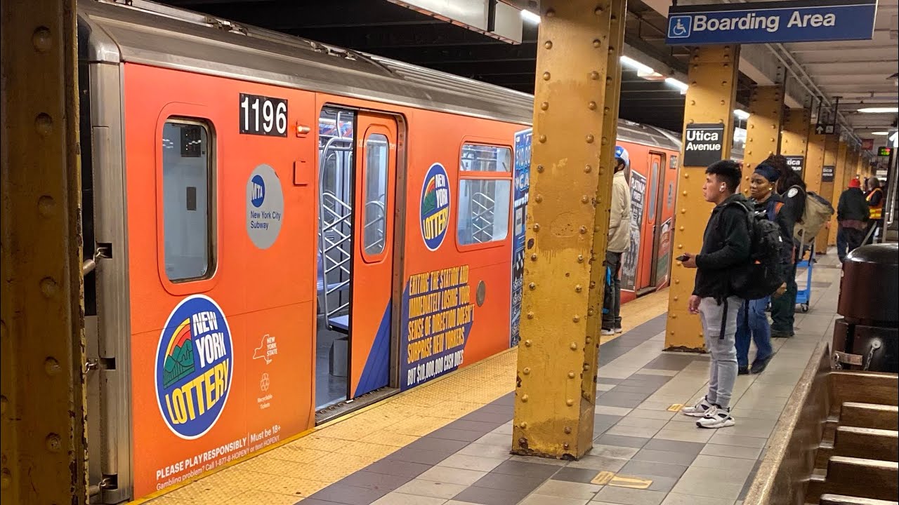 Ad-Wrapped R142’s on the (4) line - YouTube