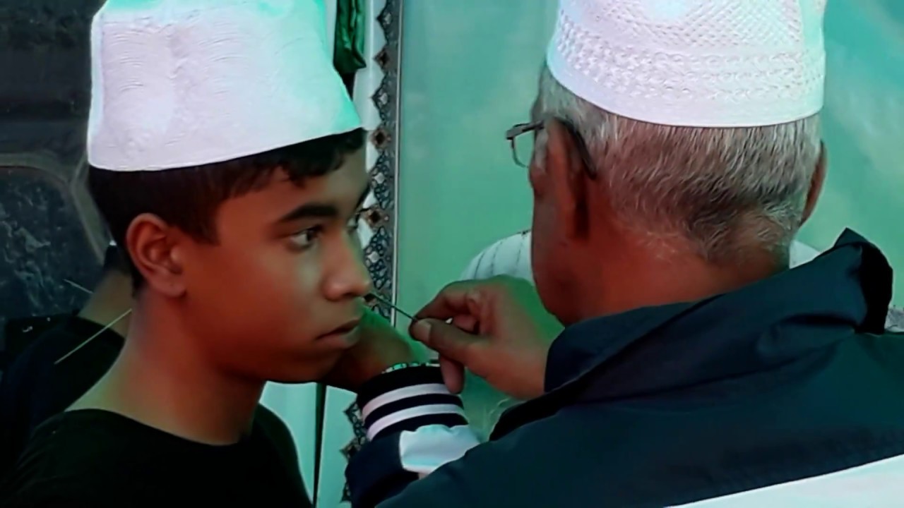 robben island mazar karamat cape town ors,taking out rod from ear and ...