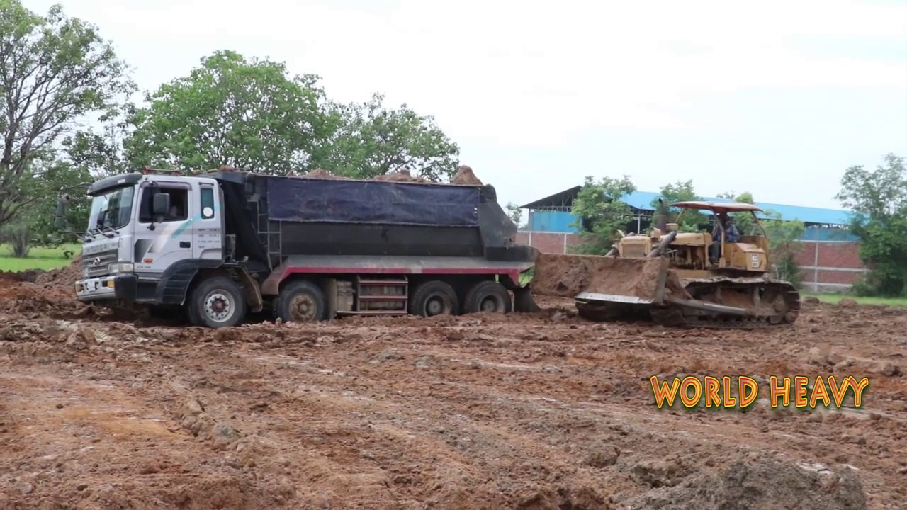 dump truck stuck - dump truck load of dirt - YouTube