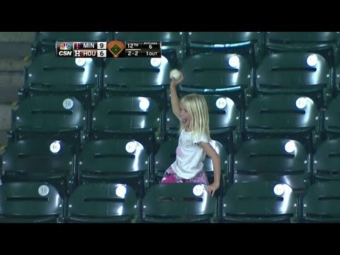 Fan gives souvenir foul ball to young girl