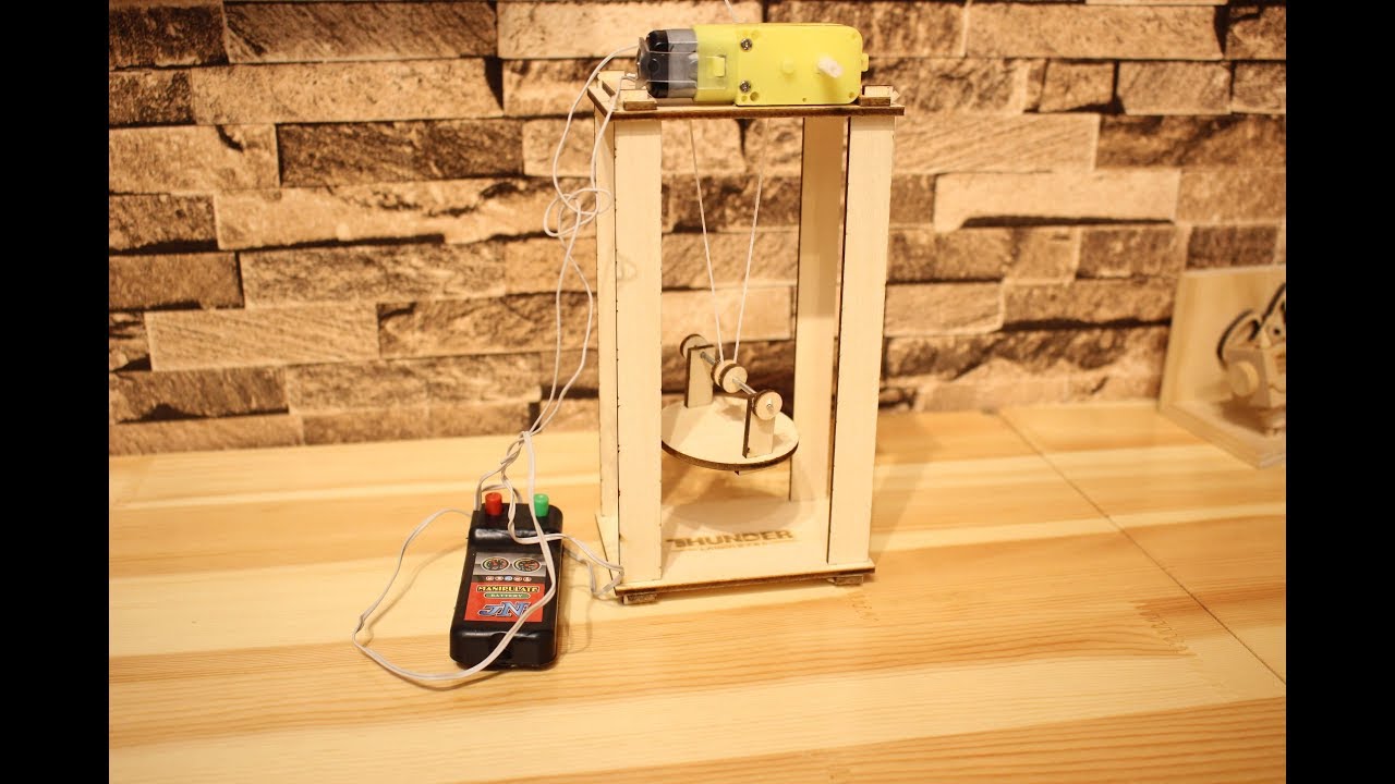 How to make an Electric lift by laser cutter - YouTube