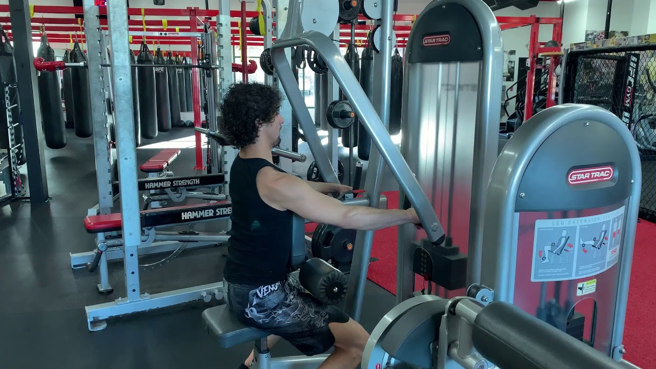Seated Machine Overhand Rows - YouTube