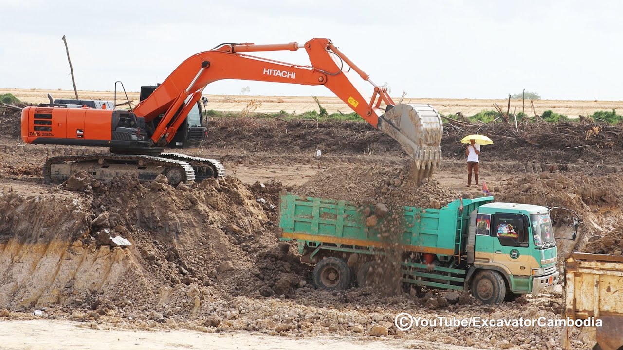 Heavy Hitachi Excavators Loading Trucks | Excavator Hitachi ZAXIS210LCH ...