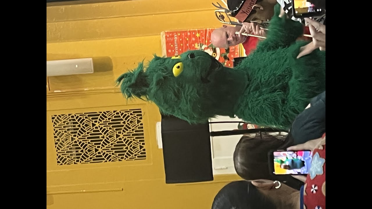 The Grinch crashes holiday express concert at the A Harry more scool ...